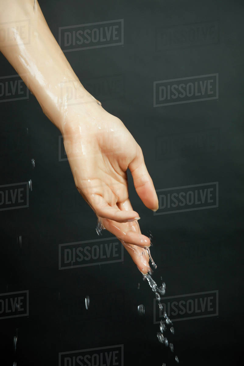 Hand under running water - Royalty-free Stock Photo | Dissolve