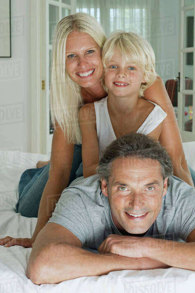 Family with one child, portrait - Royalty-free Stock Photo | Dissolve