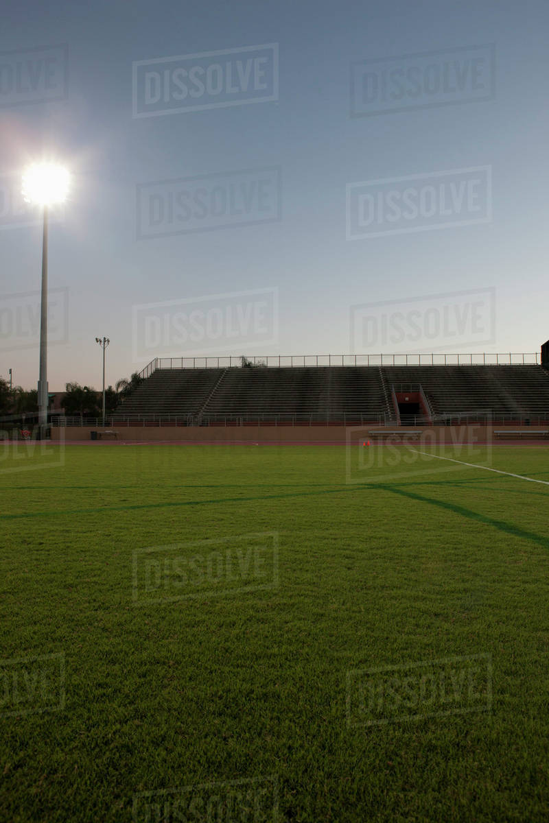 Empty sports field and stadium - Royalty-free Stock Photo | Dissolve