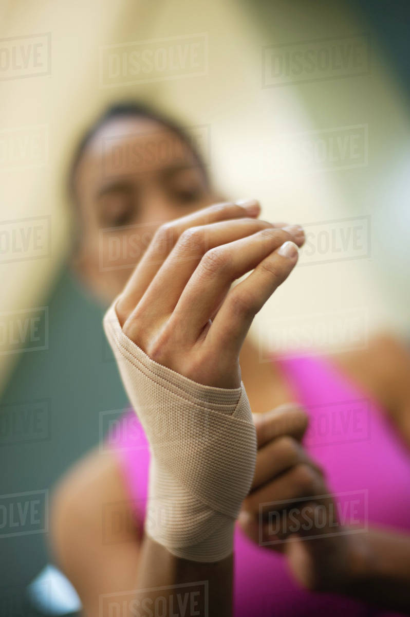 Woman with hand wrapped with bandage, low angle view - Royalty-free ...