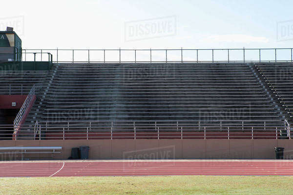 Empty stadium and running track - Royalty-free Stock Photo | Dissolve