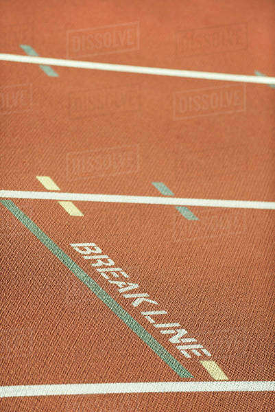 Break line marking on running track lane - Stock Photo - Dissolve