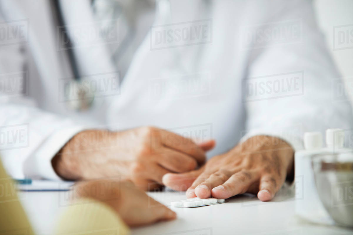 Doctor providing patient with prescription drugs - Royalty-free Stock ...