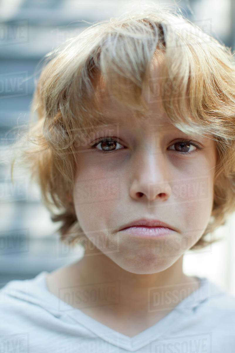 By frowning, portrait - Royalty-free Stock Photo | Dissolve