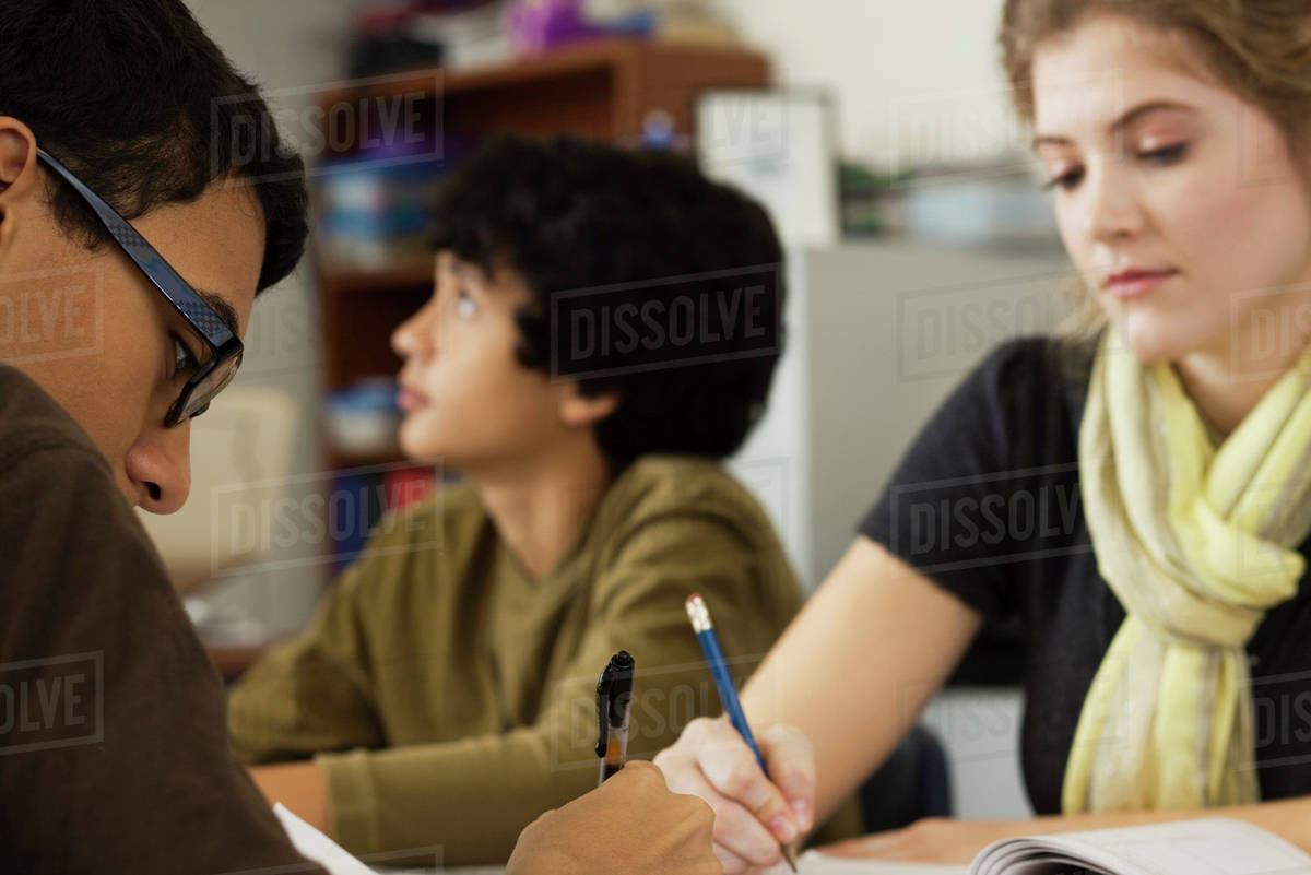 High school students completing classwork - Royalty-free Stock Photo ...