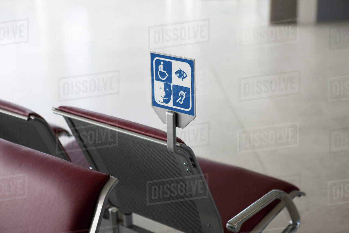Sign in waiting area designating seating for persons with disabilities ...