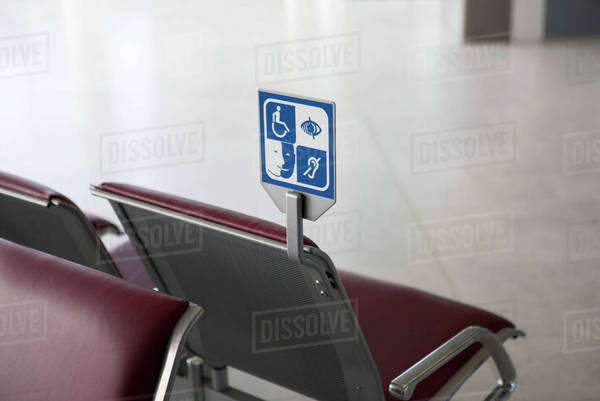Sign in waiting area designating seating for persons with disabilities ...