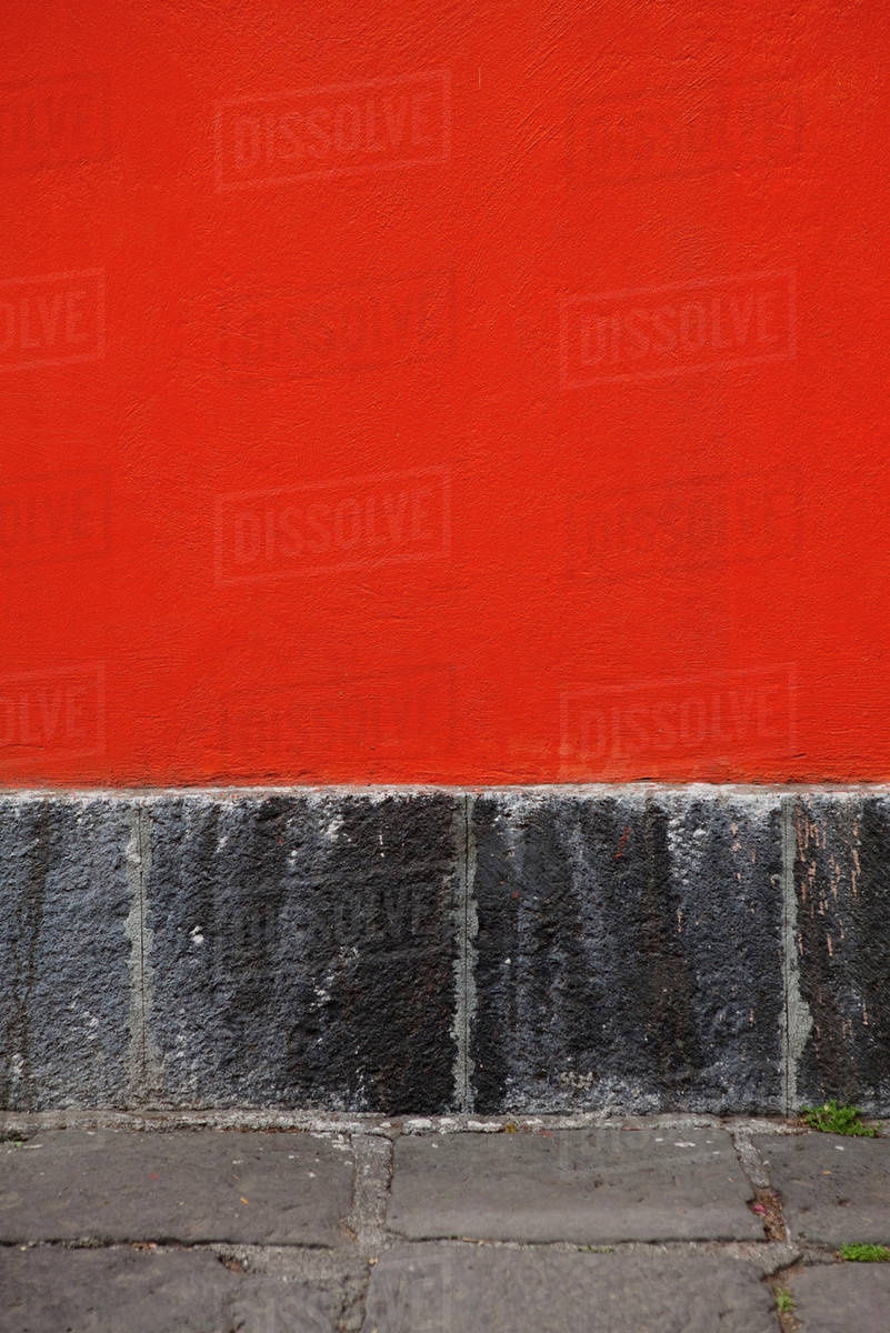Red stucco wall, close-up - Royalty-free Stock Photo | Dissolve