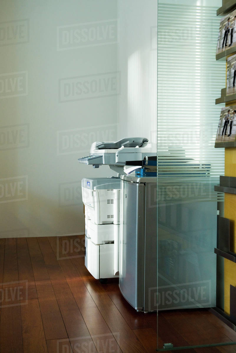 Photocopier in corner of office - Royalty-free Stock Photo | Dissolve