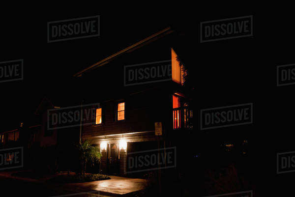 House illuminated at night - Stock Photo - Dissolve