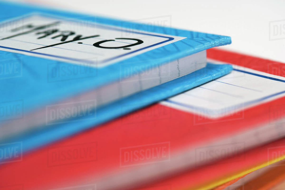 Pile of school notebooks - Royalty-free Stock Photo | Dissolve