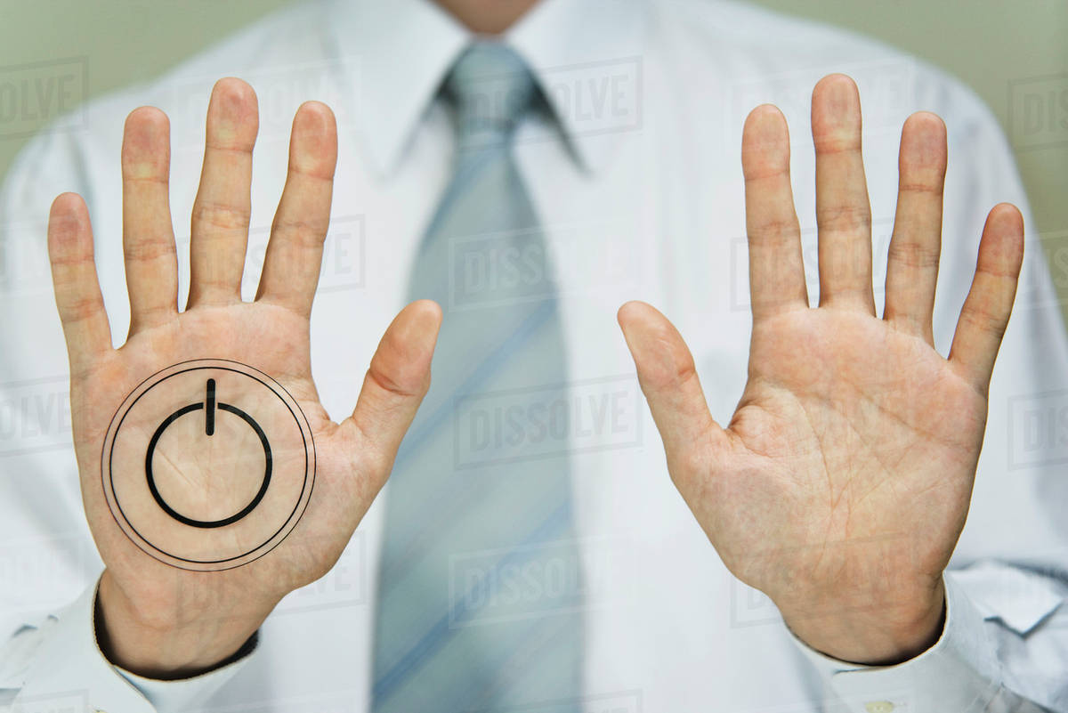Man pressing power button - Royalty-free Stock Photo | Dissolve