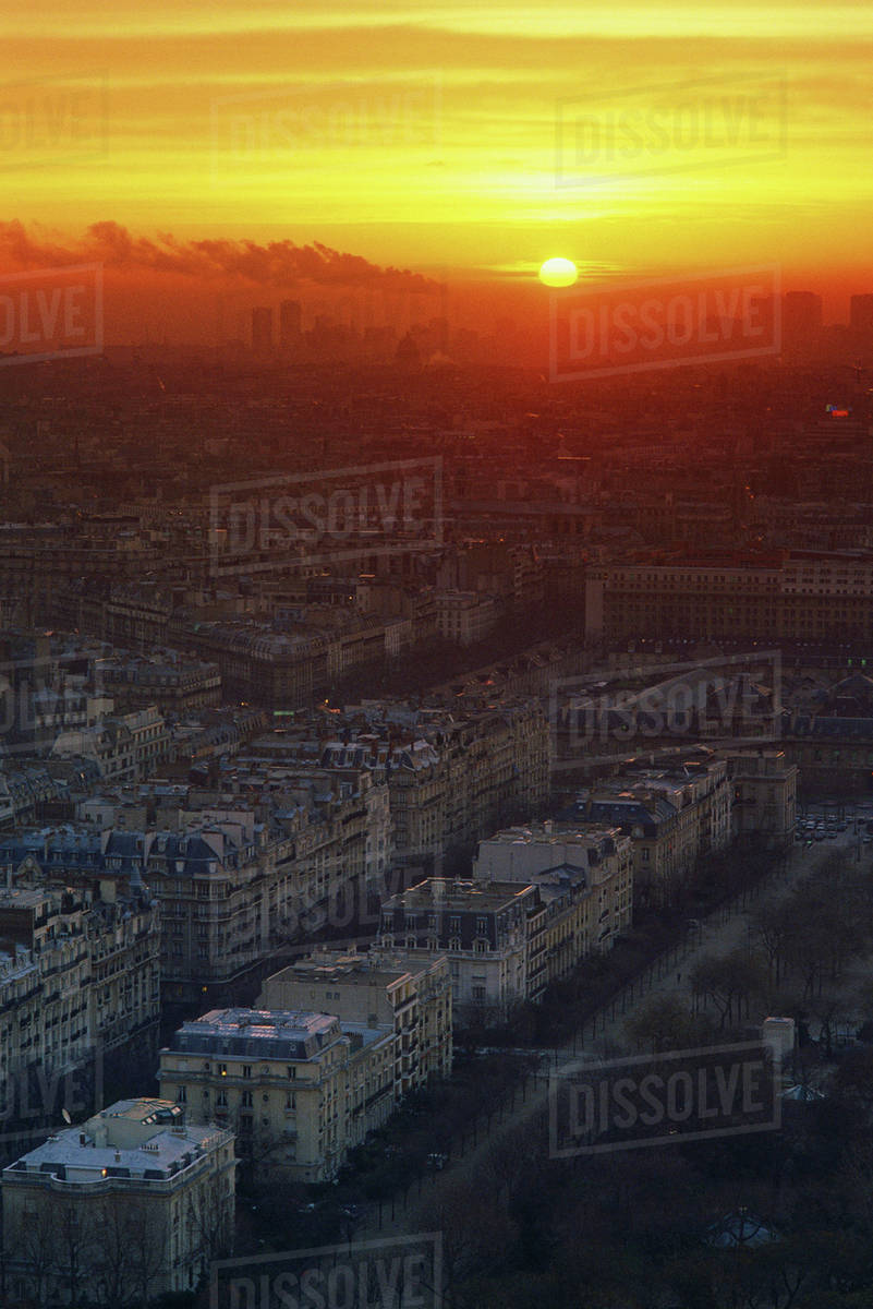 Sun rising over Paris, France - Royalty-free Stock Photo | Dissolve
