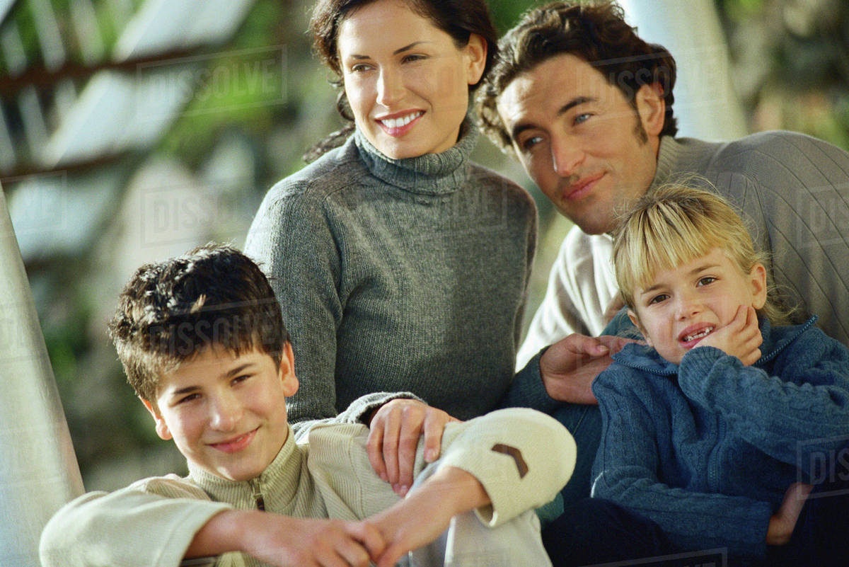 Family together outdoors, portrait - Royalty-free Stock Photo | Dissolve