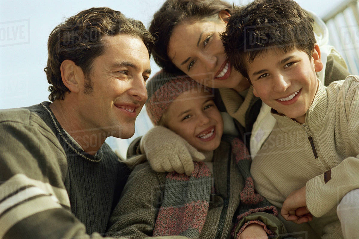 Family together outdoors, man looking at son - Royalty-free Stock Photo ...