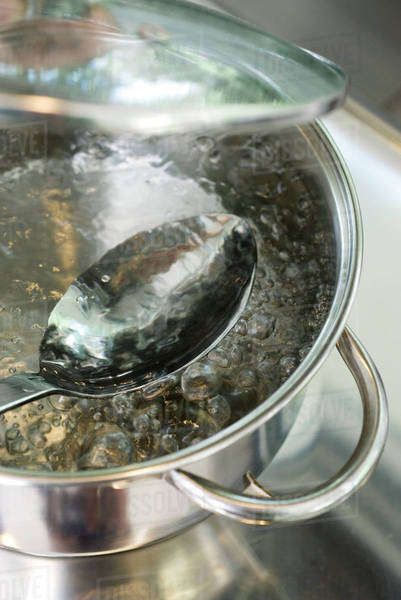 Water boiling in pot - Royalty-free Stock Photo | Dissolve