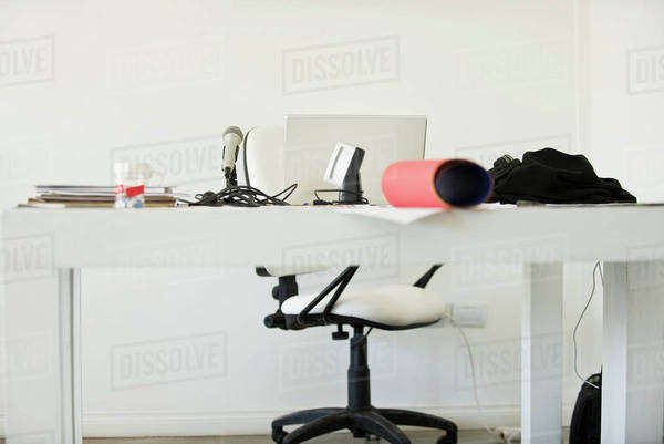 Messy desk - Stock Photo - Dissolve