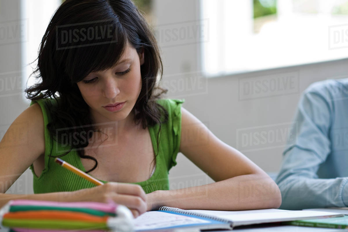 High school student doing classwork - Royalty-free Stock Photo | Dissolve