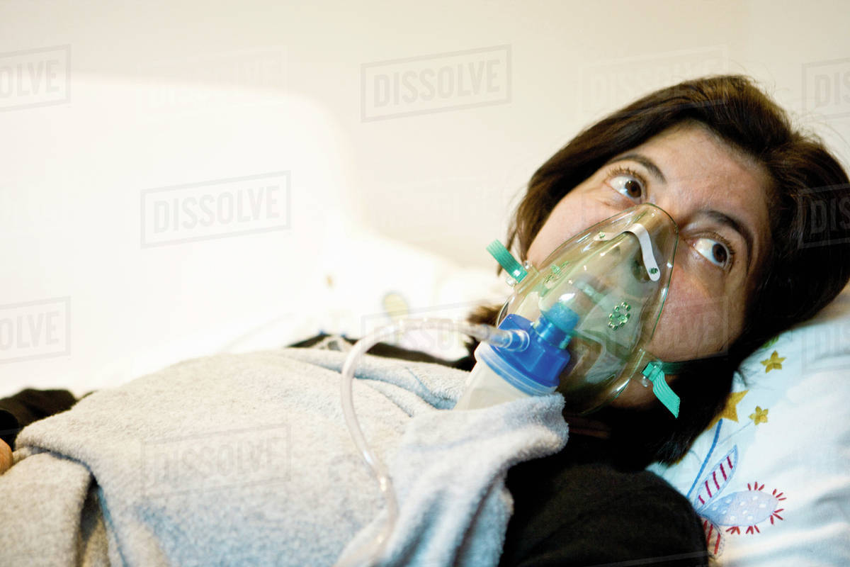 Woman receiving oxygen treatment - Royalty-free Stock Photo | Dissolve