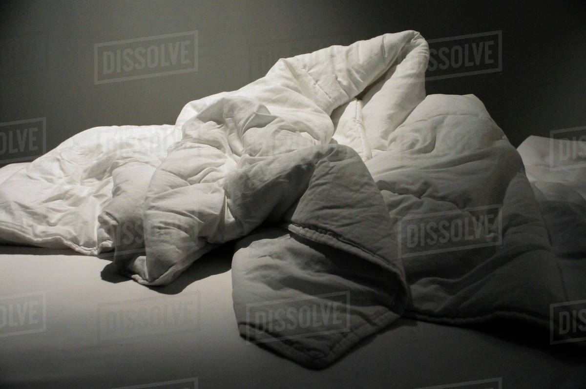 Rumpled duvet - Royalty-free Stock Photo | Dissolve
