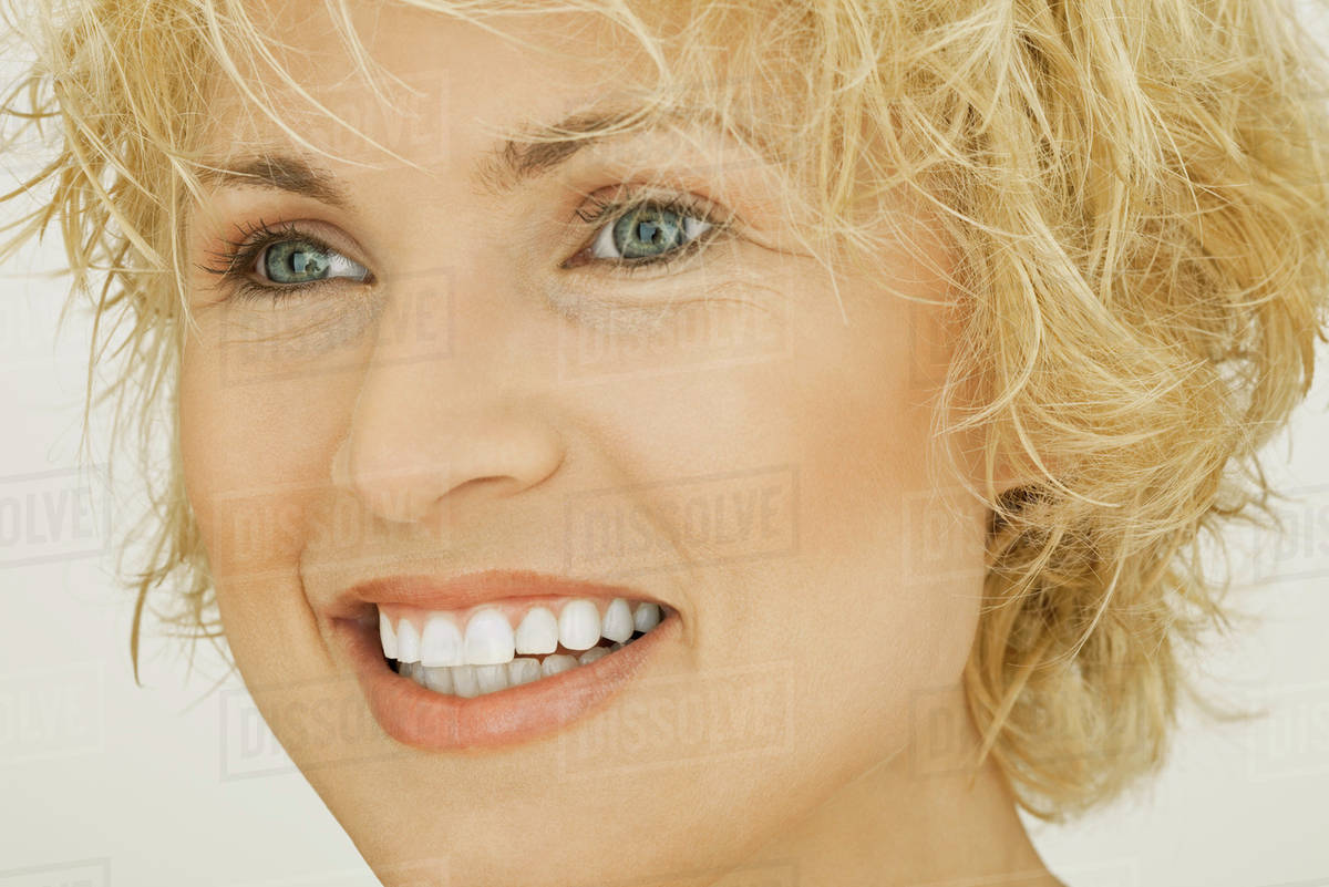 Mid-adult woman, portrait - Royalty-free Stock Photo | Dissolve