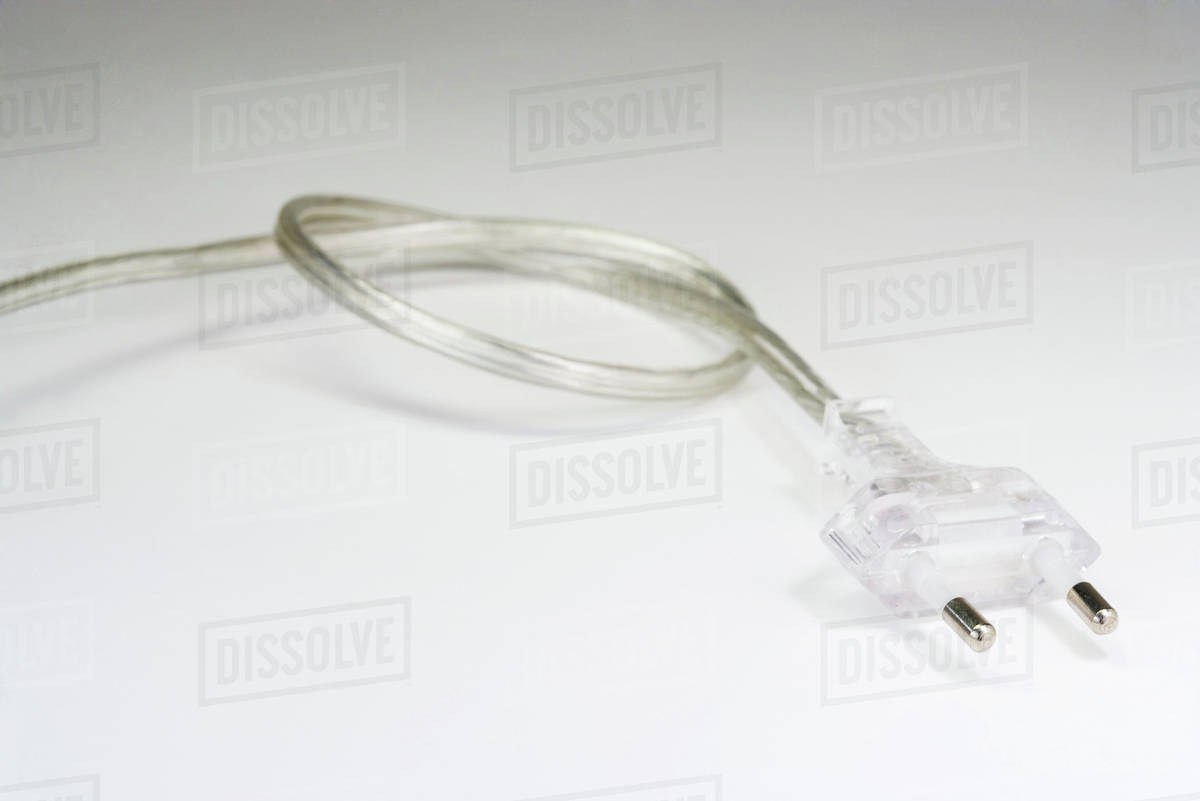 Electric cord and plug, close-up - Royalty-free Stock Photo | Dissolve
