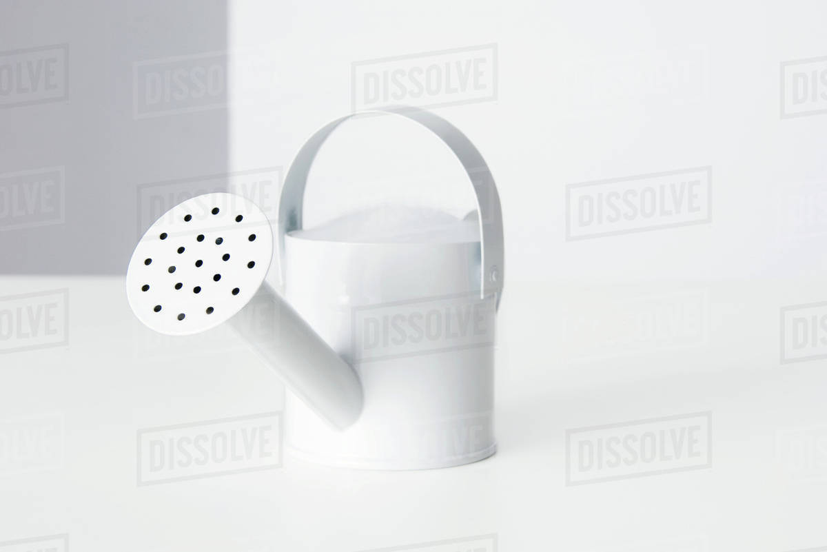 Watering can, close-up - Royalty-free Stock Photo | Dissolve