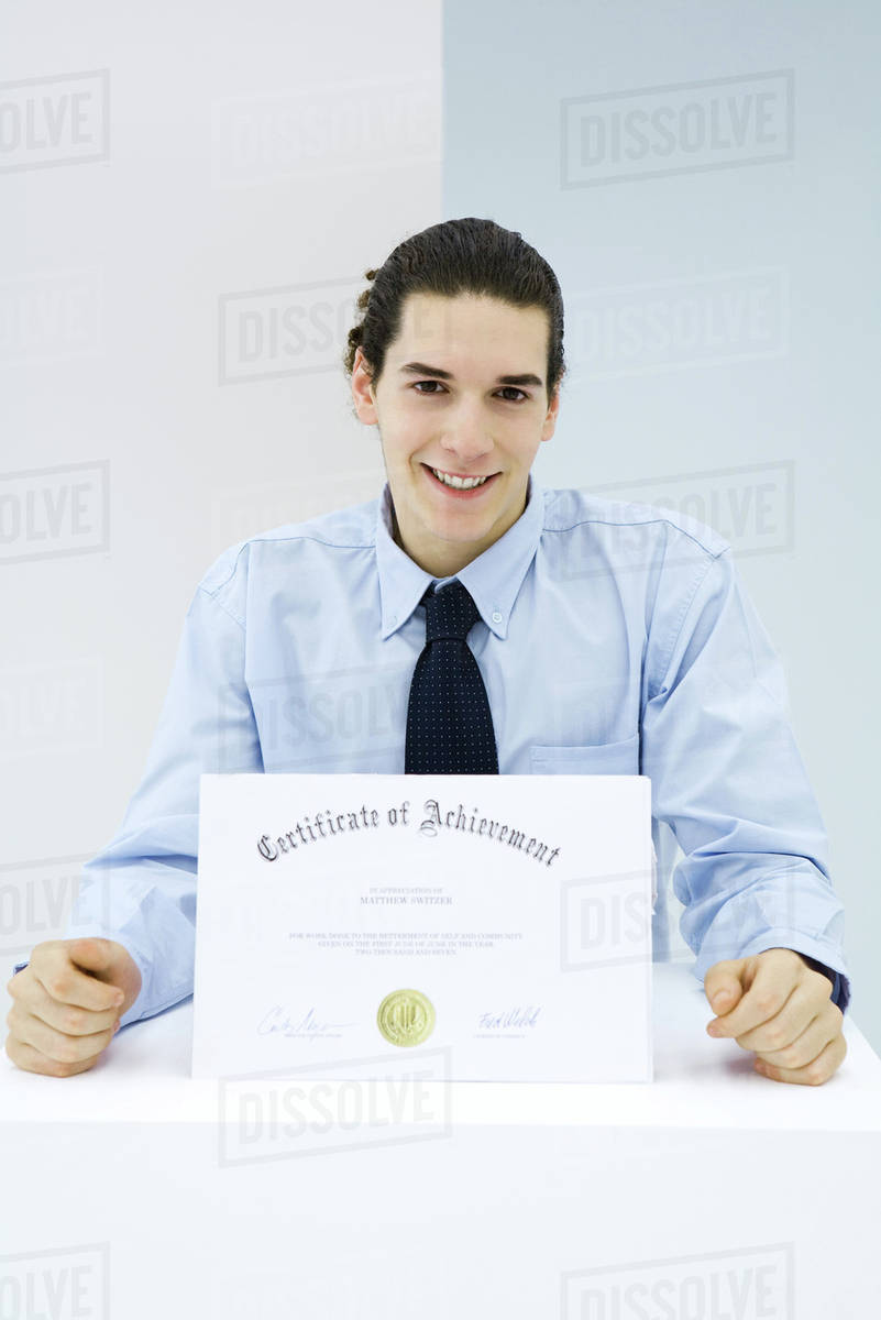 Young man receiving certificate of achievement - Royalty-free Stock ...
