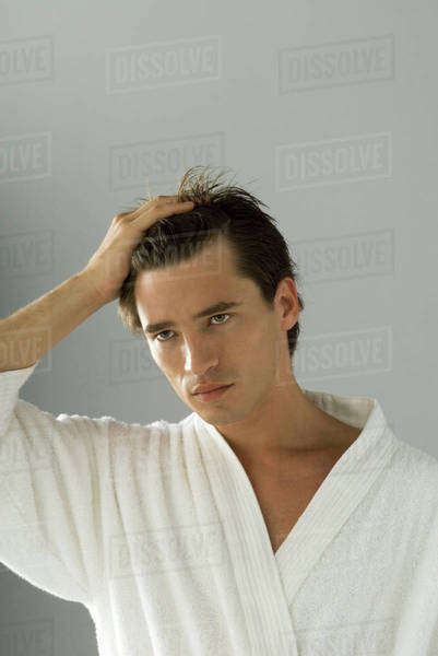 Man running hand through hair, portrait - Royalty-free Stock Photo ...