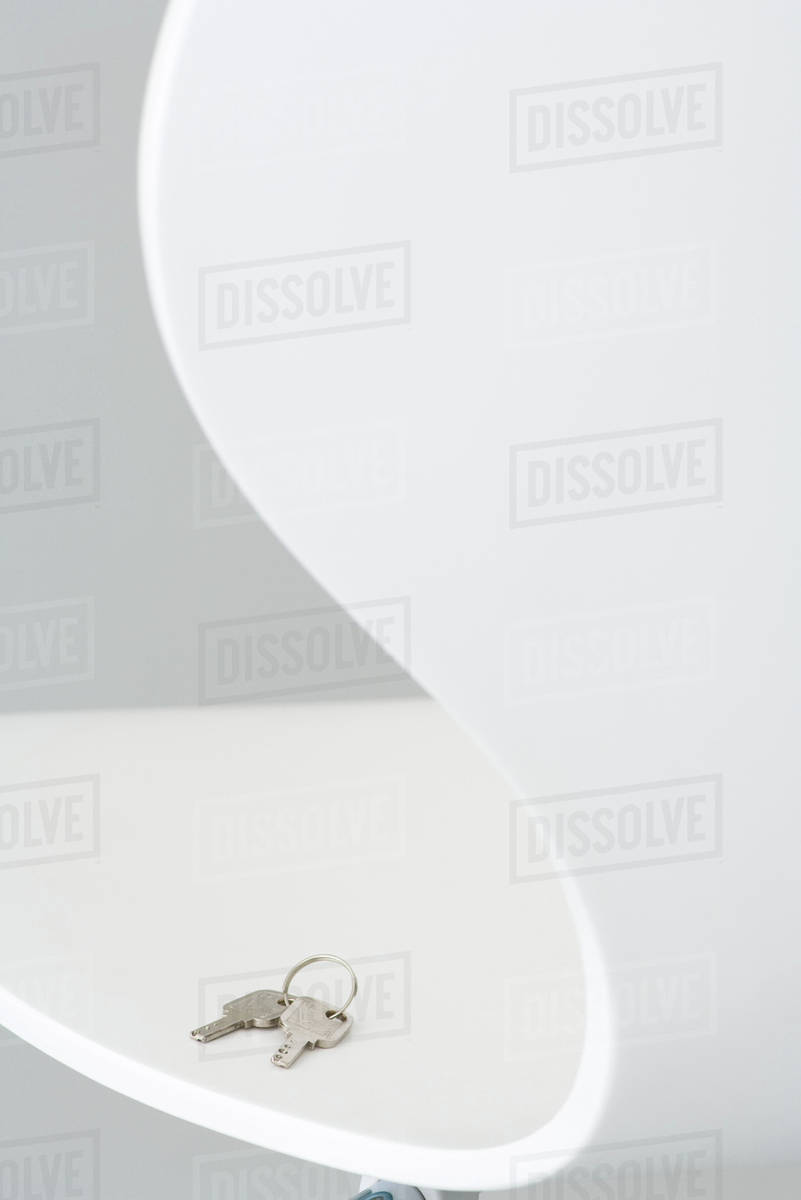 Set of keys on seat of chair - Royalty-free Stock Photo | Dissolve