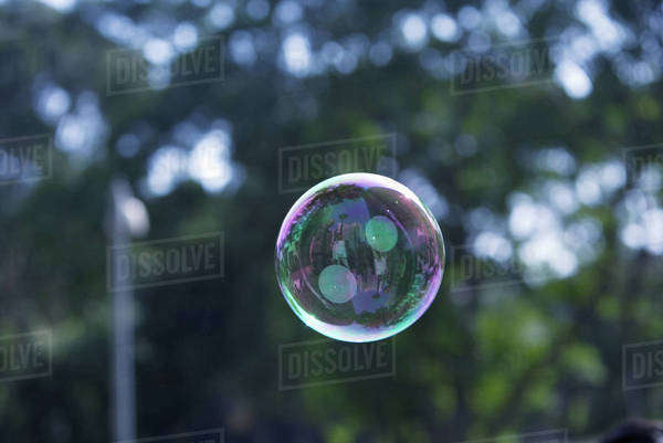 Bubble floating in air - Stock Photo - Dissolve