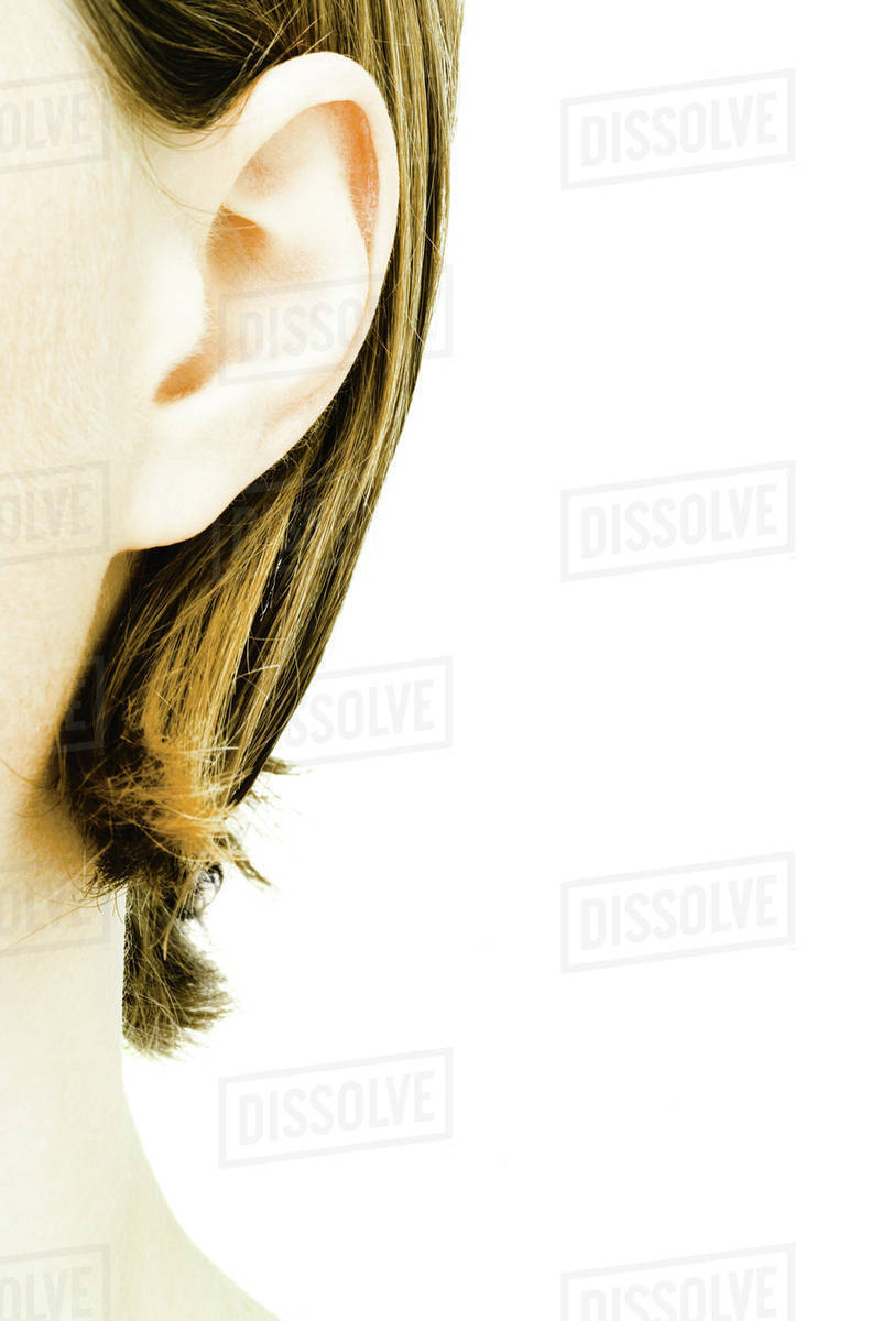 Teenage girl's ear, extreme close-up - Royalty-free Stock Photo | Dissolve