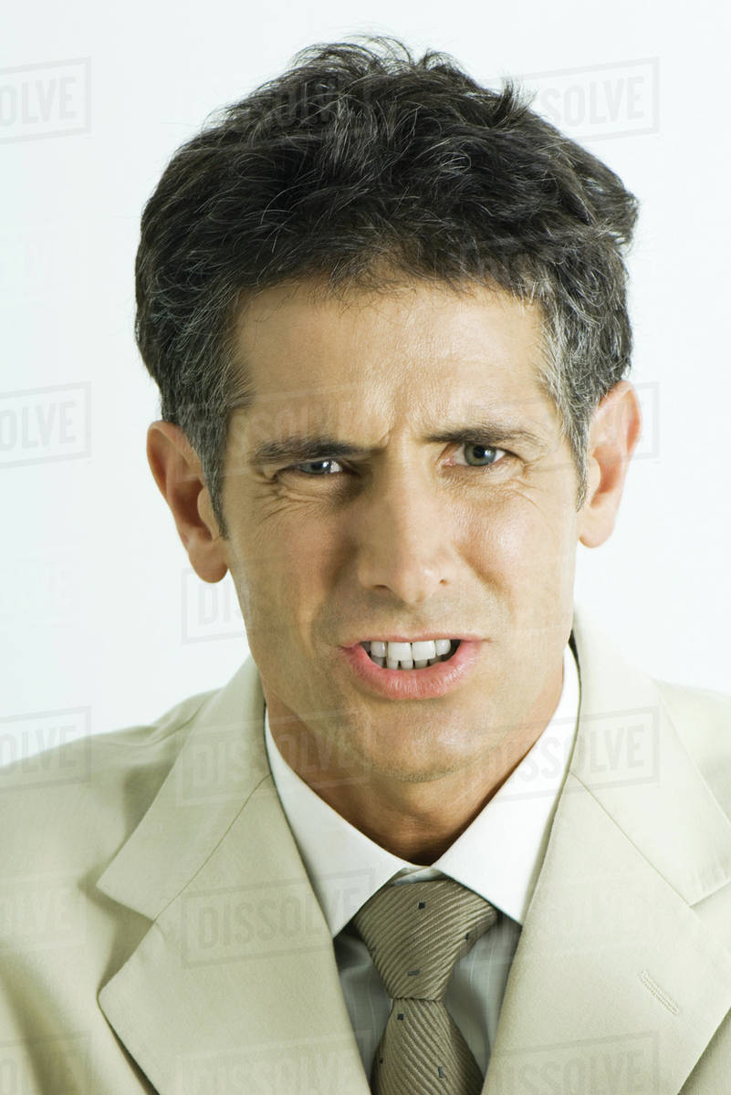 Man, speaking and furrowing brow, portrait - Royalty-free Stock Photo ...
