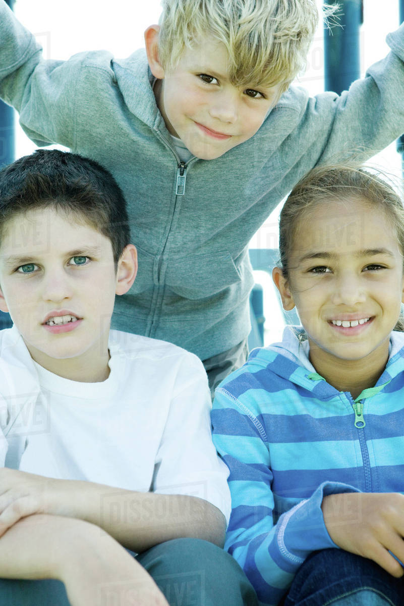 Three children, portrait - Royalty-free Stock Photo | Dissolve
