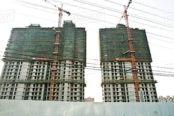 Buildings under construction - Stock Photo - Dissolve