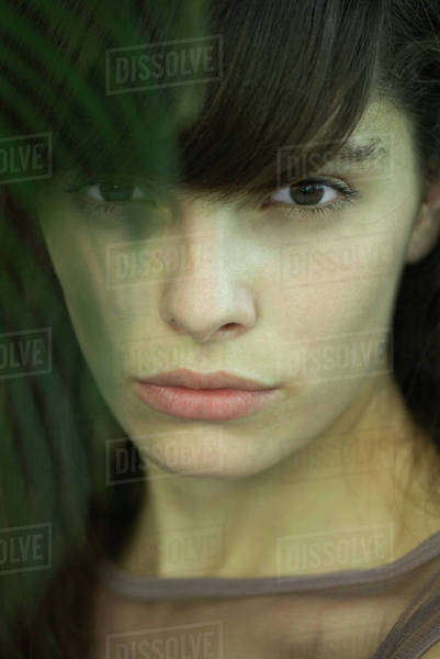 Woman looking at camera, close-up portrait - Royalty-free Stock Photo ...