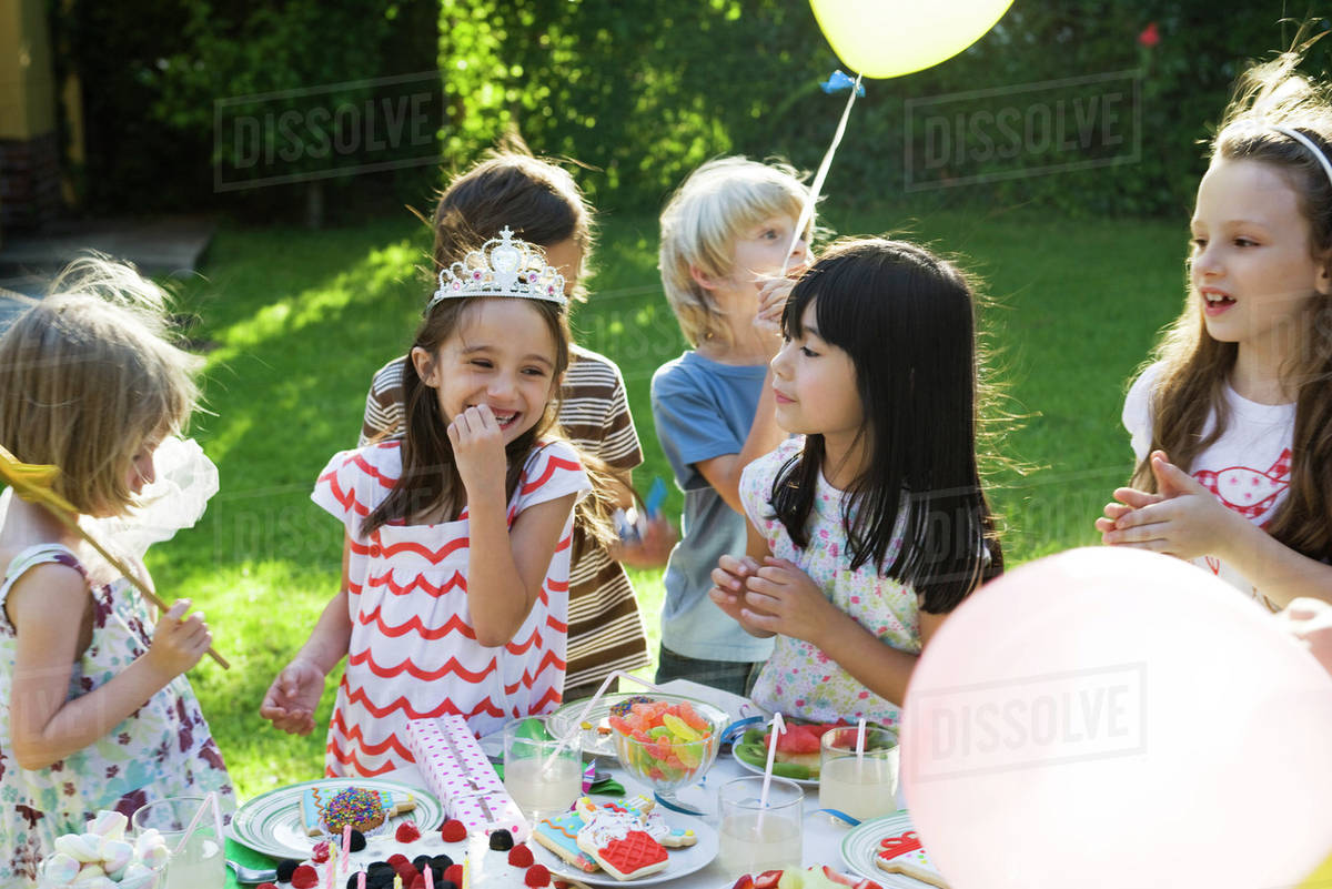 Children eating sweets at birthday party - Royalty-free Stock Photo ...