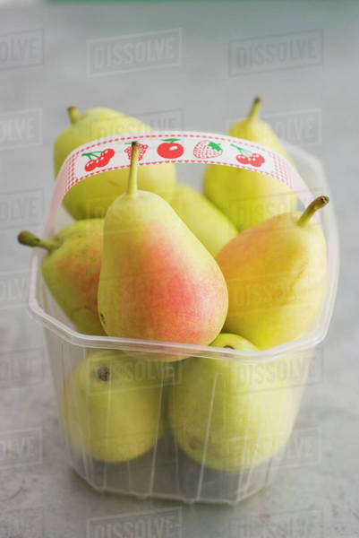 Pears in plastic container - Royalty-free Stock Photo | Dissolve