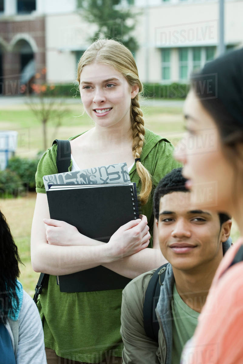 High school student chatting with friends - Royalty-free Stock Photo ...