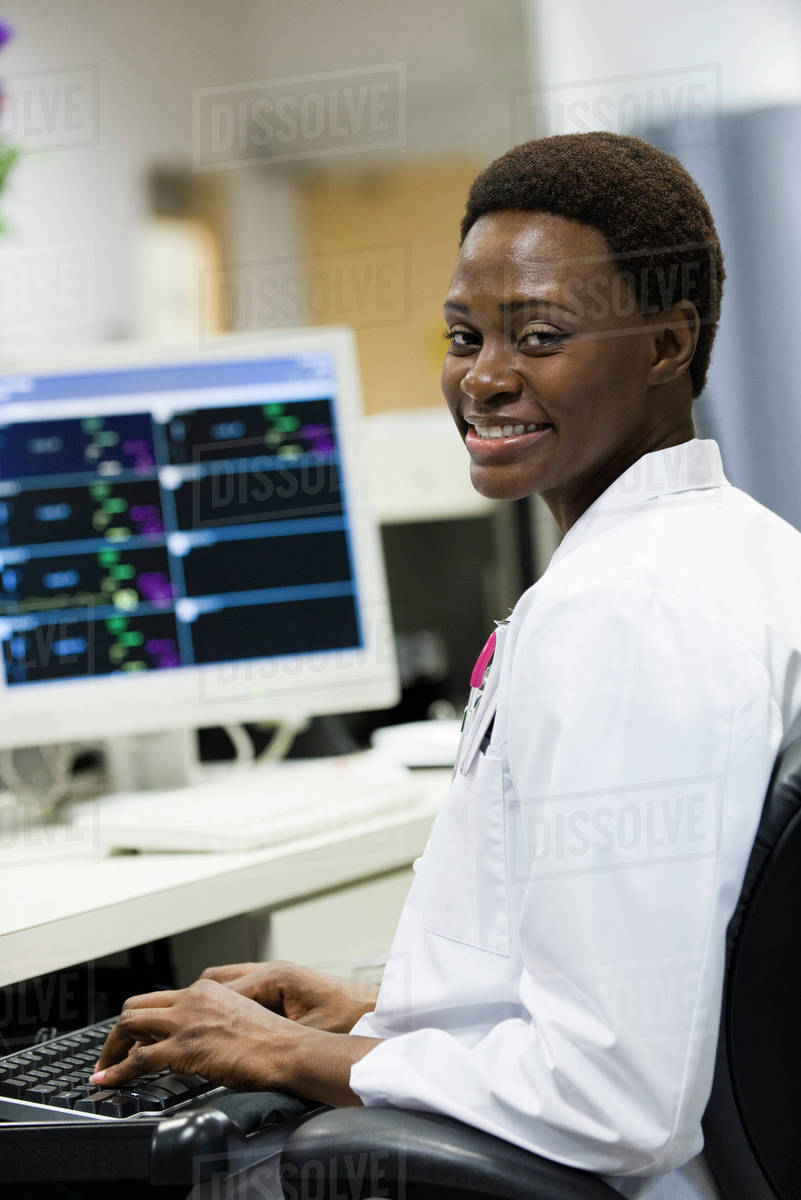 Healthcare worker using computer, portrait - Royalty-free Stock Photo ...