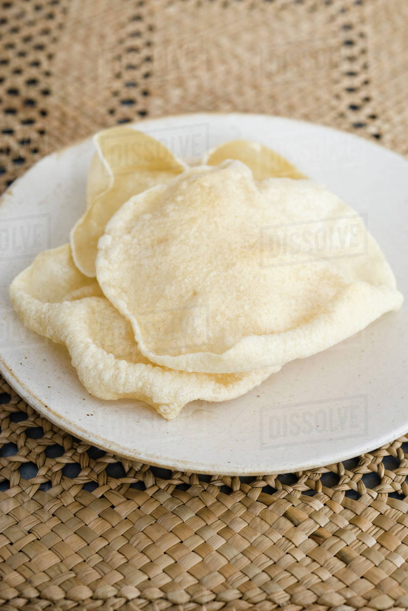 Fresh papadum - Stock Photo - Dissolve