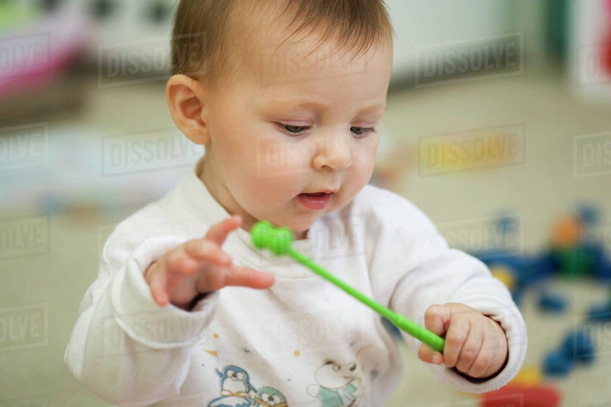 Baby playing - Royalty-free Stock Photo | Dissolve