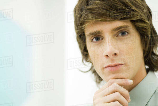 Male looking at camera, portrait, close-up - Stock Photo - Dissolve