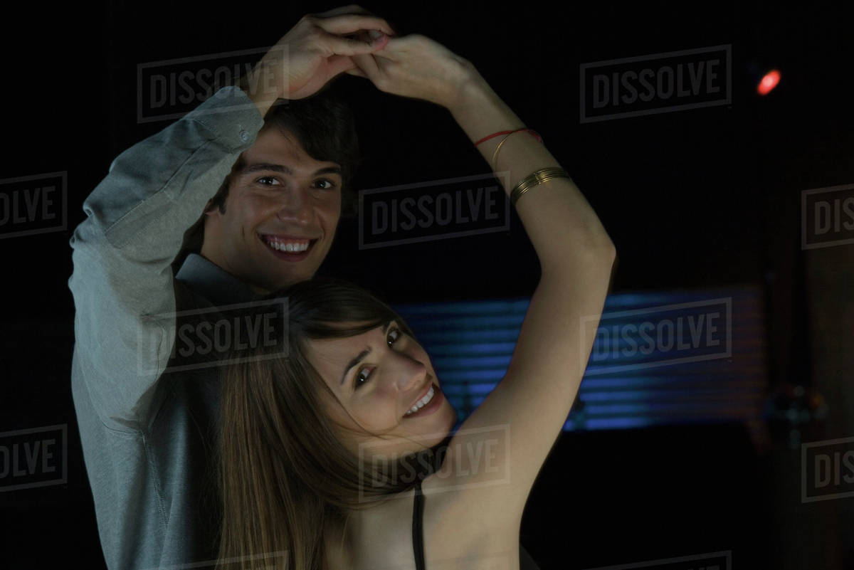 Couple dancing, smiling at camera, portrait - Royalty-free Stock Photo ...