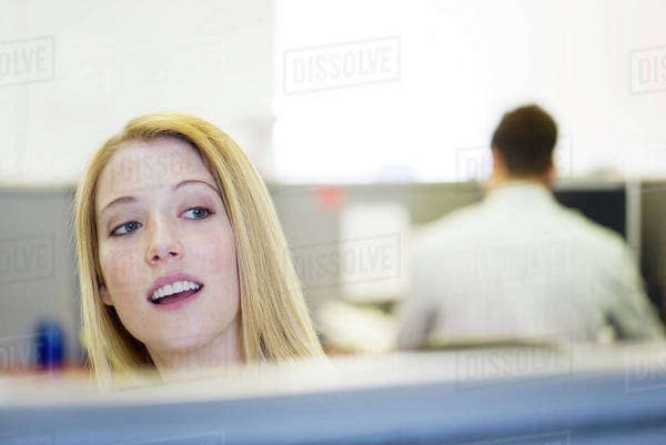 Office worker peering over cubicle wall - Royalty-free Stock Photo ...