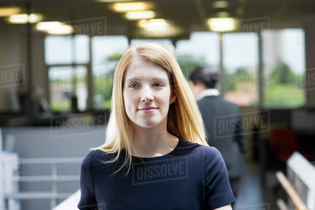 Young woman beginning internship, portrait - Stock Photo - Dissolve