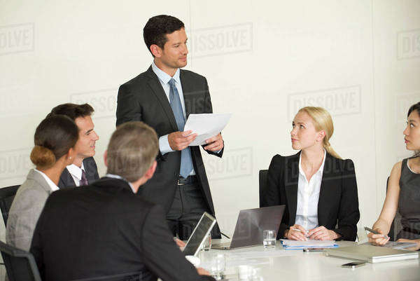 Executive giving presentation in meeting - Royalty-free Stock Photo ...