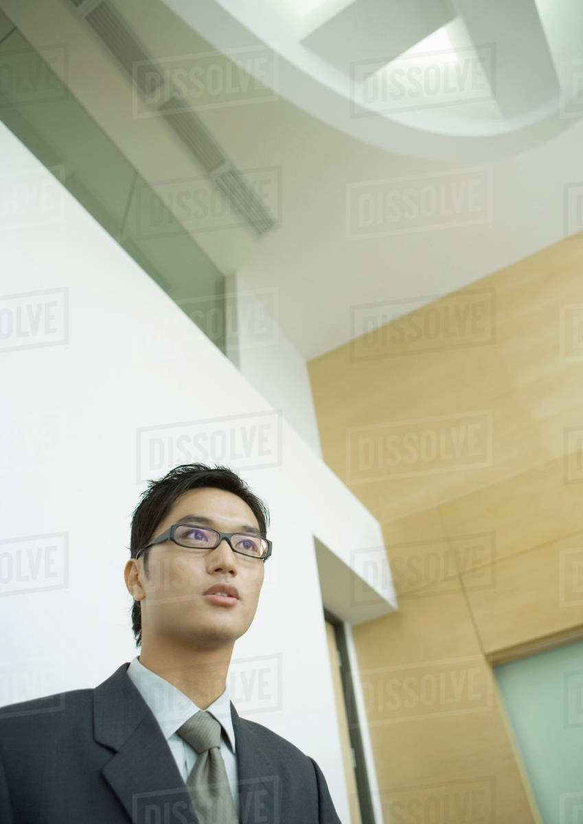 Businessman, head and shoulders, low angle view - Royalty-free Stock ...