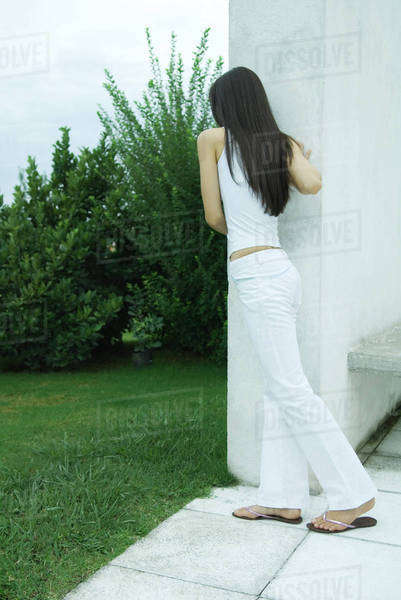 Girl Looking Around Corner