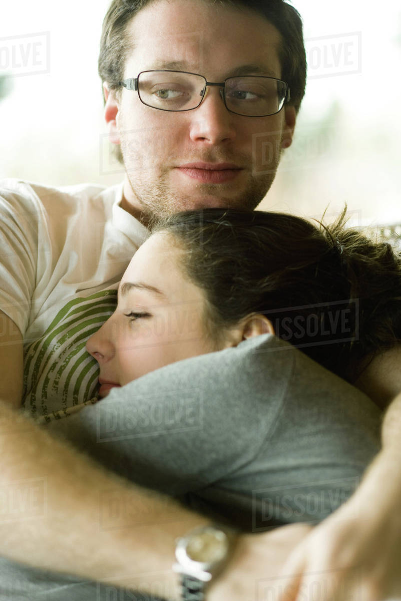 Teen girl hugging young man, close-up - Royalty-free Stock Photo | Dissolve